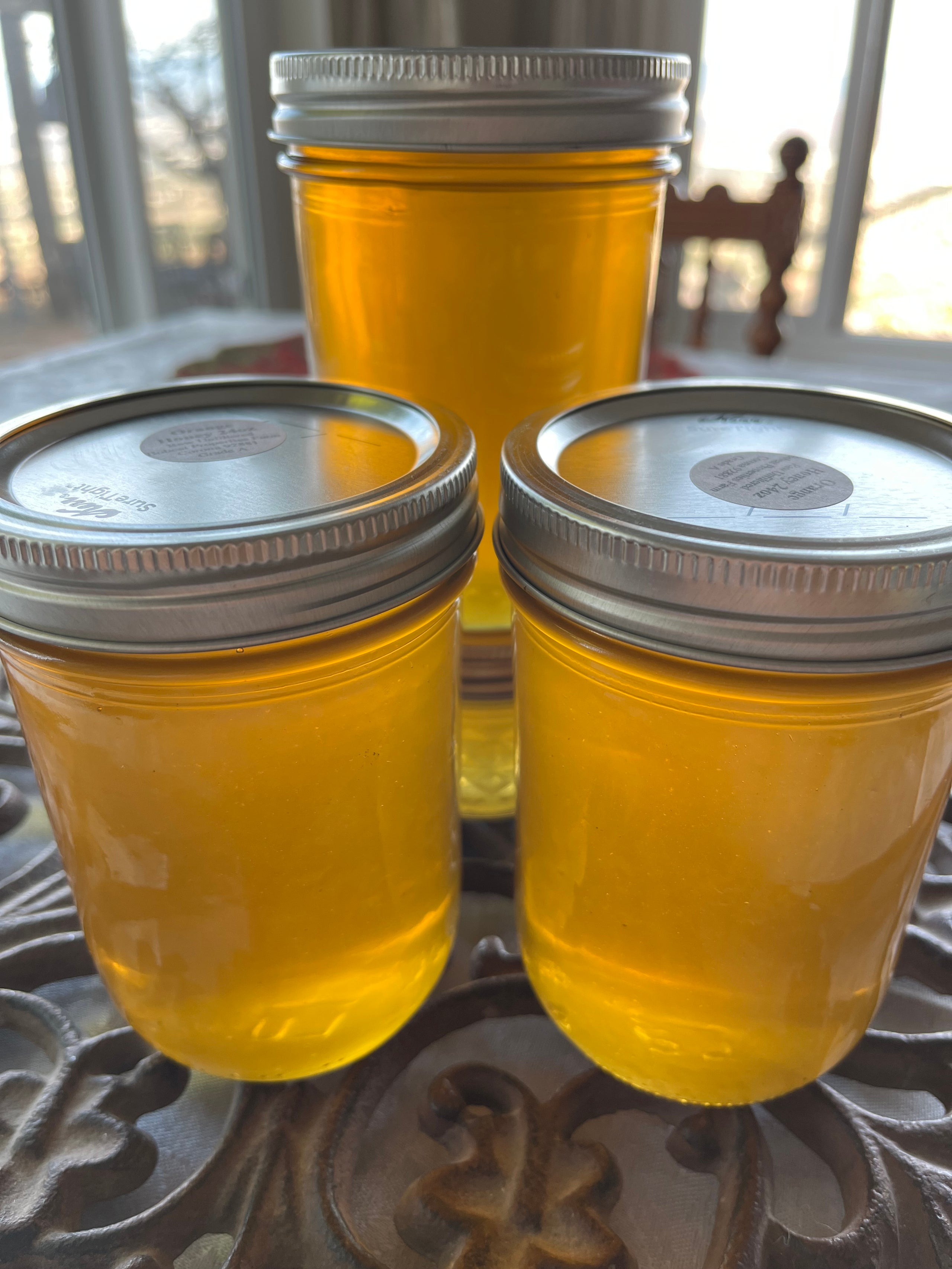 Orange 24 oz glass jar | Bobcat Properties Farm